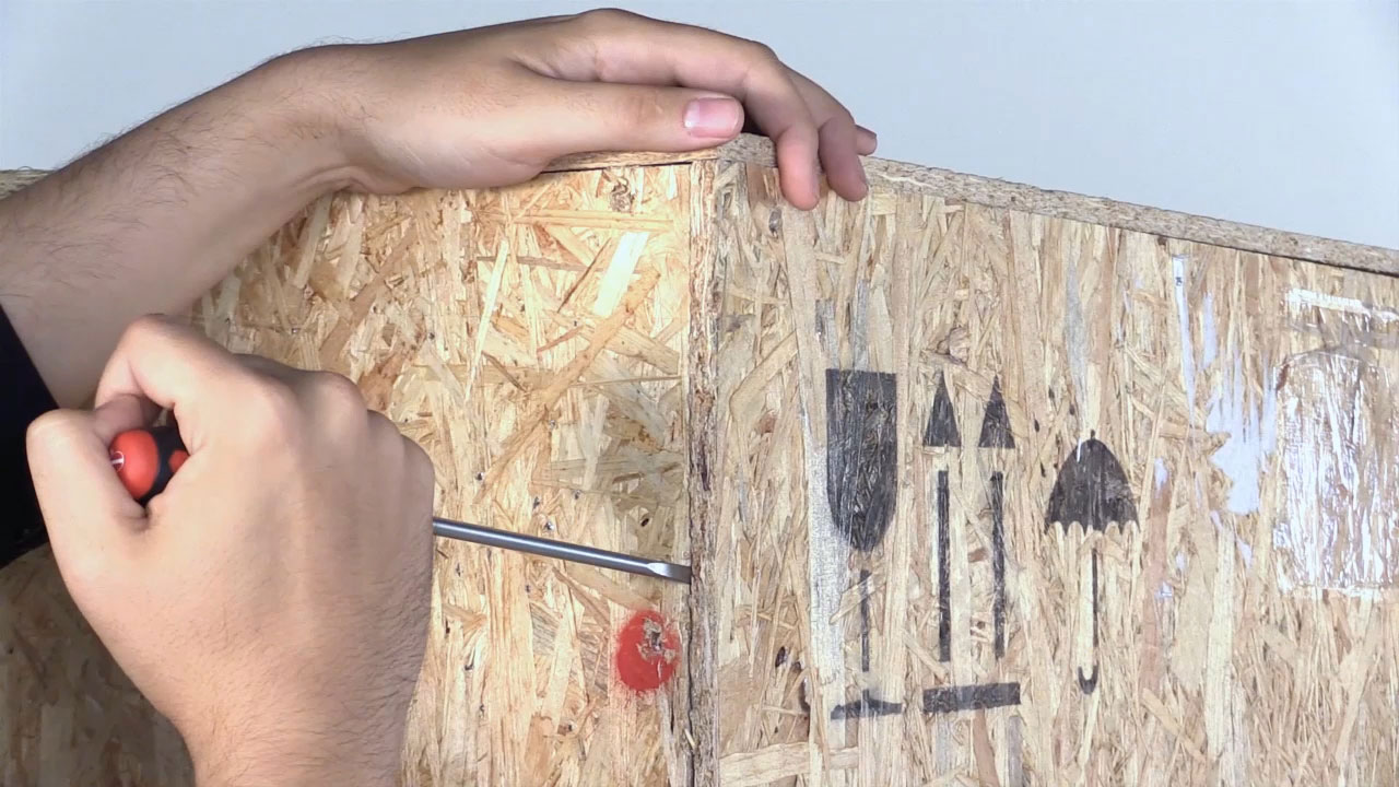 the straps and screws carefully cut the straps from the crate and ...