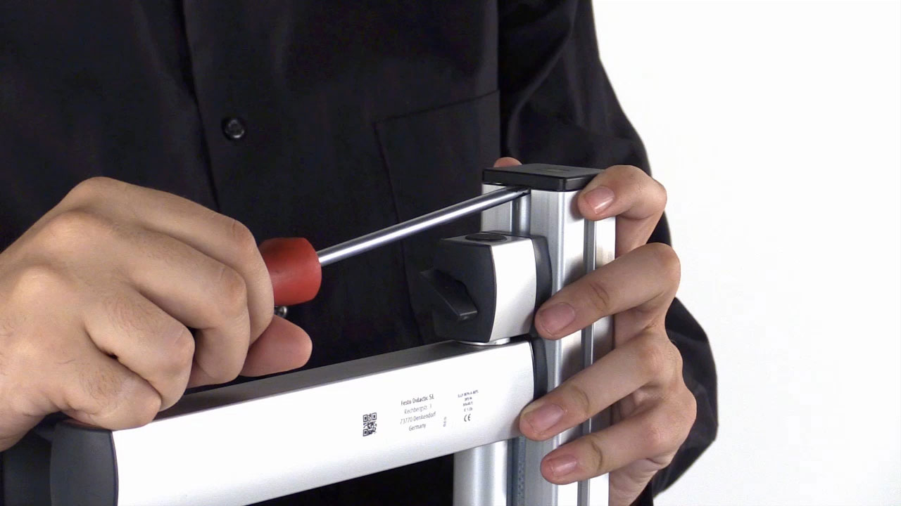 remove both power cord holding pins from the station and release the ...